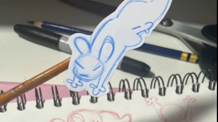 Paper Slugcat watches doodler